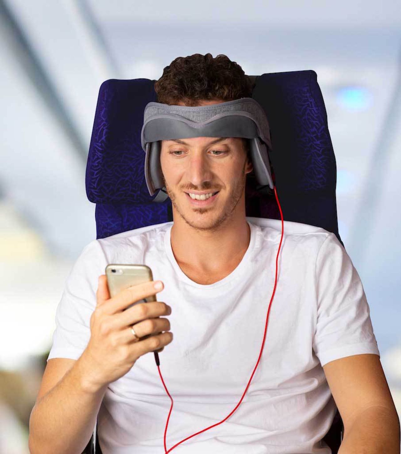 NapUp Fly vill göra det enklare att sova på flyget. Säkrar upp huvudet ...